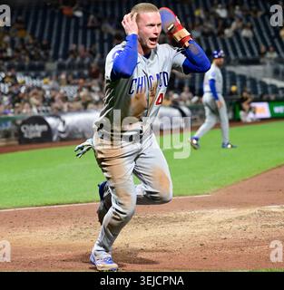Chicago Cubs' Pete Crow-Armstrong, center, hits a one-run single ...