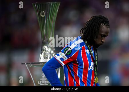 Evann Guessand of Crystal Palace FC lifts the trophy during the award ...