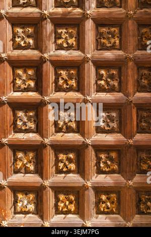 Ornate carved wooden door with geometric Islamic patterns at Hazrat ...