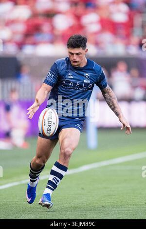 Bristol Bears' Louis Rees-Zammit is tackled by Bath's Ben Spencer ...