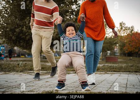Happy family spending quality time together outdoor during fall Stock ...