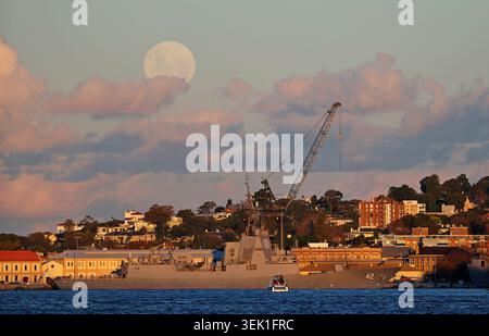 The full moon, known as the Blue Moon, is seen behind the Al Fanar ...