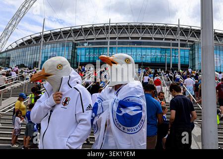 London, UK. 31 May 2026. Pictured: An Arsenal fan lights several flares ...