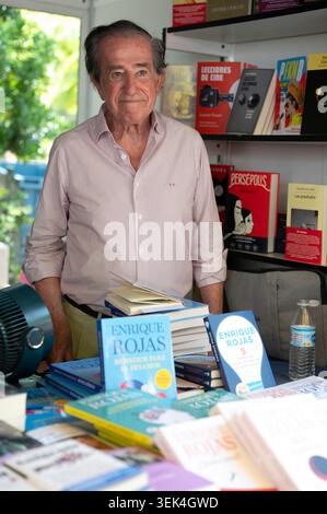 Author Enrique rojas signs copies of her books during the 85th edition ...