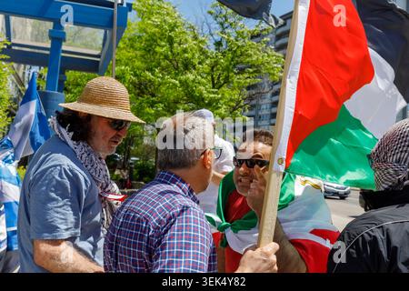 Toronto, Canada. 31st May, 2026. Pro-Israel protesters (facing) argues ...