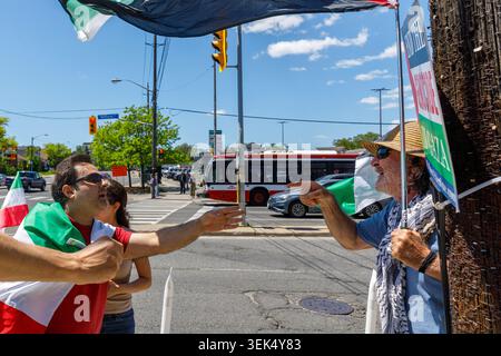 Toronto, Canada. 31st May, 2026. Pro-Israel protesters (facing) argues ...