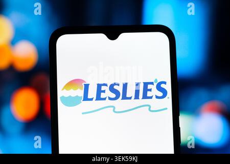 In this photo illustration, the Leslie's logo is seen displayed on a ...