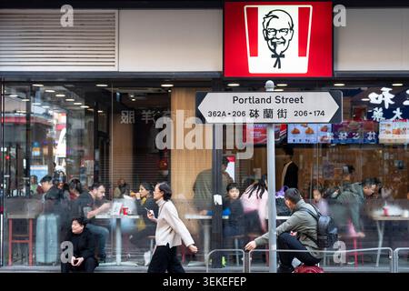 Pedestrians seen outside the American fast food chicken restaurant ...