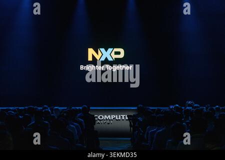 An NXP Semiconductors logo on the screen at a keynote at Computex 2026 ...