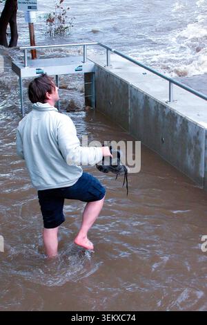 people after heavy rainfall seeing the effect of climate dynamic people ...