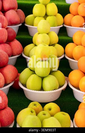 The market features beautifully displayed peaches, cherries, apricots ...