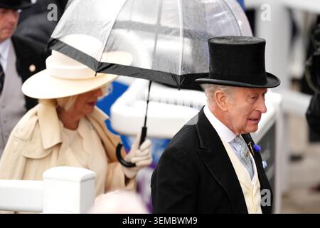 King Charles III and Queen Camilla during Derby Day of the Betfred ...