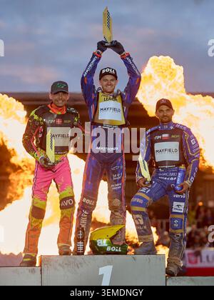 Bartosz Zmarzlik of Poland #95 celebrates with his kids on the podium ...