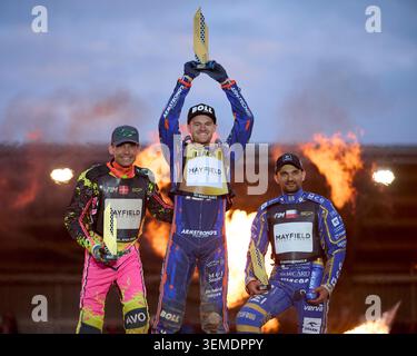 Bartosz Zmarzlik of Poland #95 celebrates with his kids on the podium ...