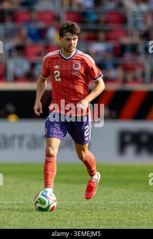 Aaron Hickey (2) of Scotland plays the ball during an international ...