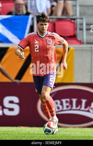 Aaron Hickey (2) of Scotland plays the ball during an international ...