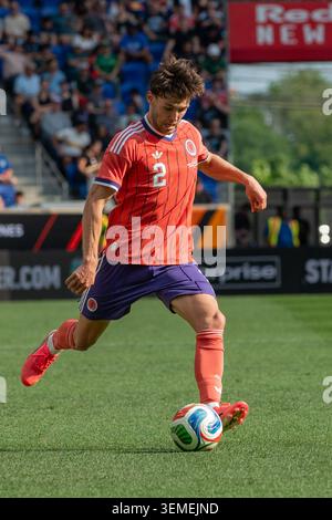 Aaron Hickey (2) of Scotland plays the ball during an international ...
