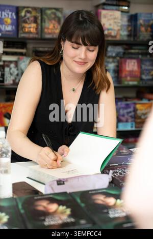 Alba Cargol signs copies of her books during the 85th edition of the ...