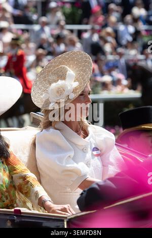 Peter Phillips and his wife Harriet Sperling speak to James Wolf (right ...