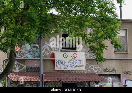 Berlin, Germany. 06th June, 2026. A demonstrator holds a handwritten ...