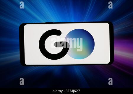 In this photo illustration, the GO Inc logo is seen displayed on a ...