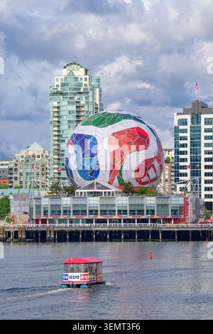 A False Creek Ferry with a FIFA soccer ball atop at the Olympic Village ...