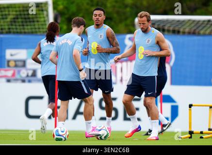 Harry Kane of England and Morgan Rogers of England looks dejected ...
