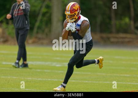 Washington Commanders wide receiver Van Jefferson (12) watches the ball ...