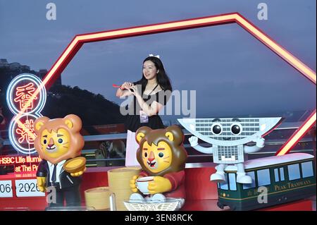 A lady posing photo with a exhibit of HSBC Life Illuminations at The ...