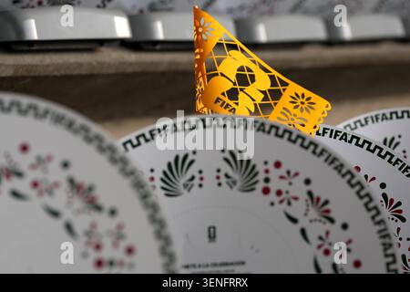 FIFA-branded items for fans and flags on seats inside the stadium ...