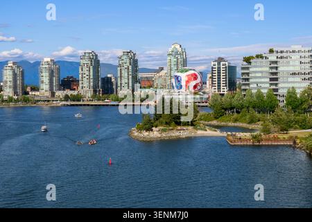A False Creek Ferry with a FIFA soccer ball atop at the Olympic Village ...