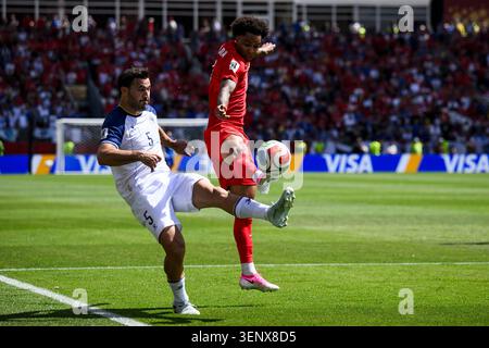 Tajon Buchanan of Canada competes for the ball with Amar Memic of ...