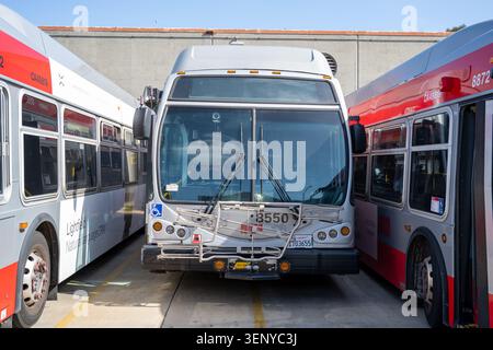 MUNI buses are visible at the MUNI bus yard in the Dogpatch, San ...