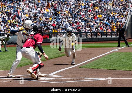 West Virginia utility Armani Guzman (5) hits the ball foul an NCAA ...