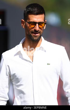 Novak Djokovic looks on in the Paddock during the F1 Grand Prix of ...