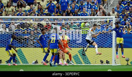 Curaçao goalkeeper Eloy Room, left, is embraced after the World Cup ...