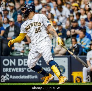Milwaukee Brewers' Gary Sánchez hits an RBI single during the second ...