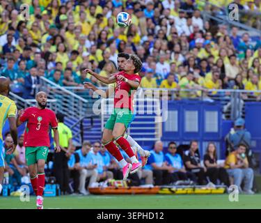 Neil El Aynaoui (Morocco) and Scott McTominay (Scotland) battle for the ...
