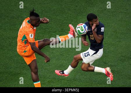 Pedro Vite (R) of Ecuador competes for the ball with Wilfried Singo of ...