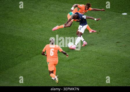 Enner Valencia of Ecuador cimpetes for the ball with Emmanuel Agbadou ...