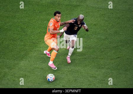 Guela Doue of Cote d'Ivoire competes for the ball with Enner Valencia ...