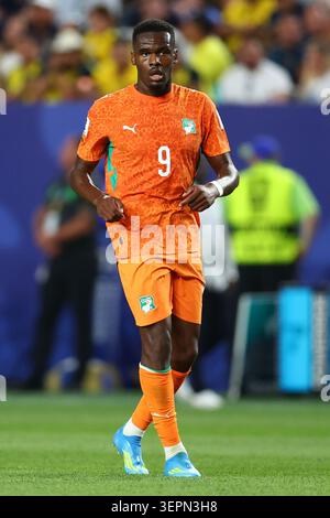 Ange-Yoan Bonny of Ivory Coast contests with Jonathan Tah of Germany ...