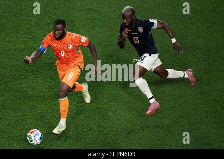 Franck Kessie of Cote d'Ivoire competes for the ball with Enner ...
