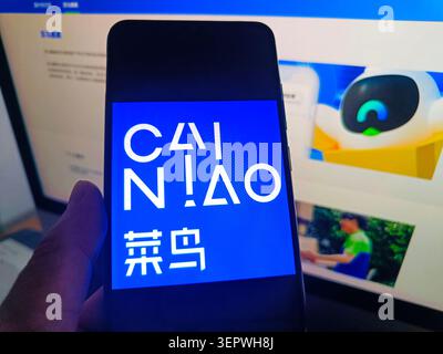SUQIAN, CHINA - JUNE 16, 2026 - A netizen is using his mobilephone to ...