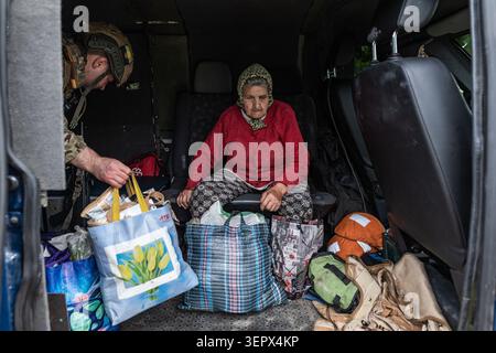 Druzhkivka, Ukraine. 15th June, 2026. A woman seen being evacuated by ...