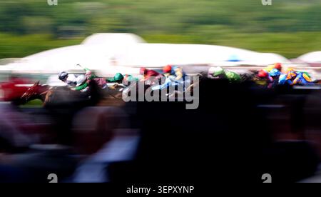 Runners and riders in action during the King Charles III Stakes on day ...