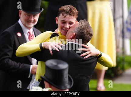 Jockey Billy Loughnane celebrates with father Mark Loughnane after Bow ...