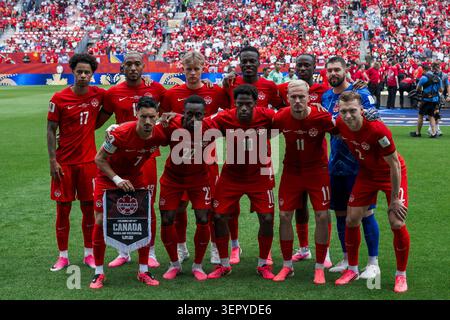 Canada players pose for a team photo before the World Cup Group B ...