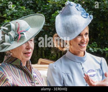 Peter Phillips and his wife Harriet Sperling speak to James Wolf (right ...