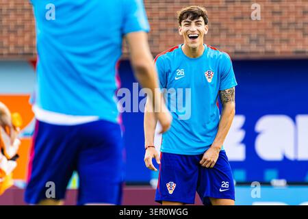 Croatia forward Petar Musa (26) volleys the ball during the England vs ...